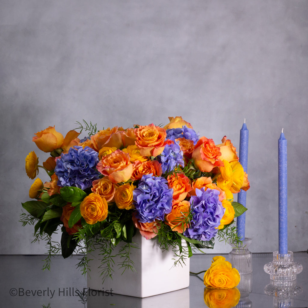 Orange and blue flowers store
